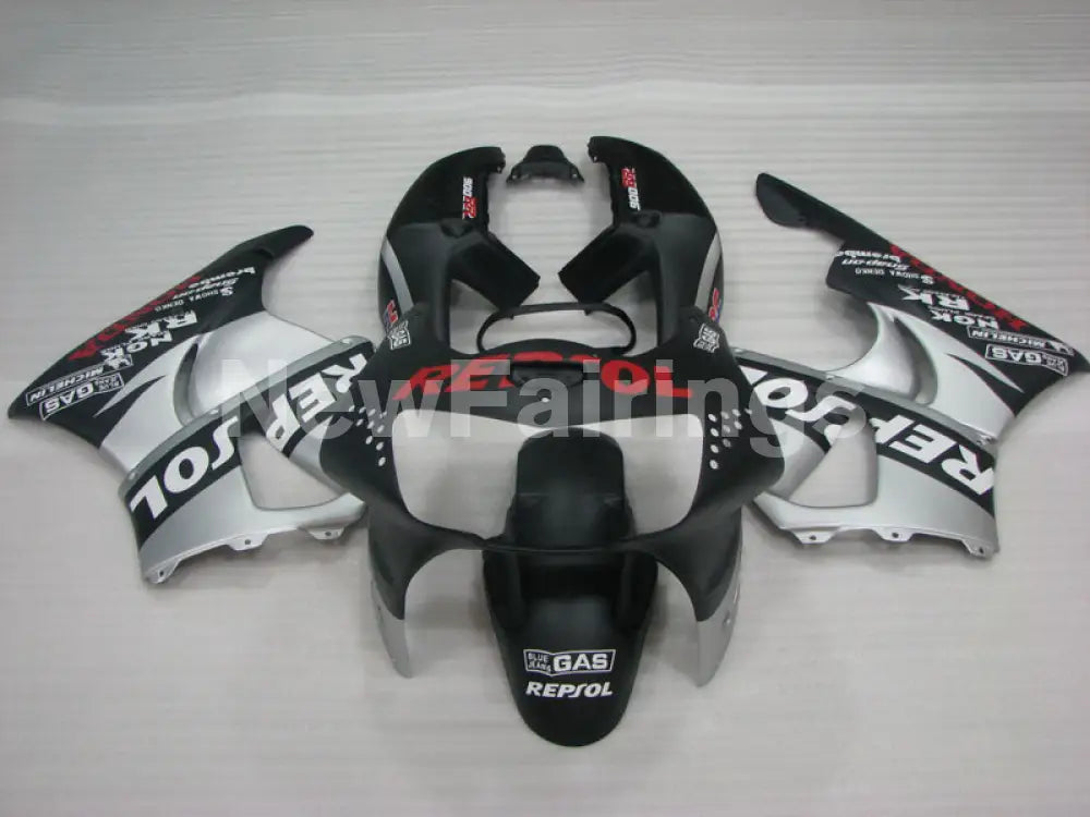 Upgrade Your Ride with Matte Black & Silver Repsol - CBR 919 RR Fairing ...