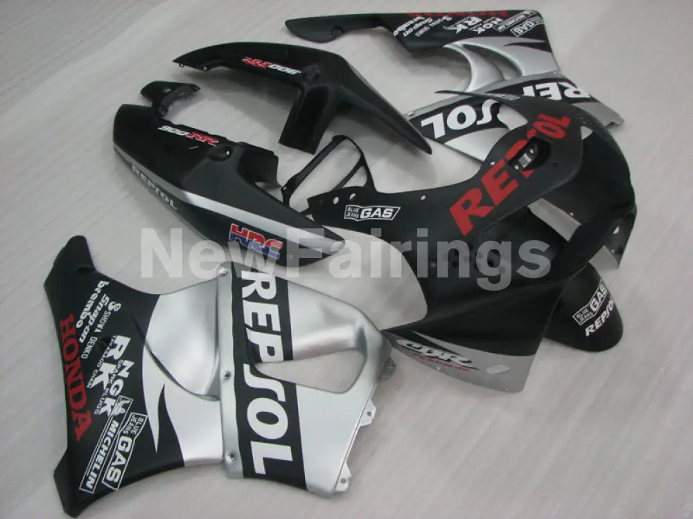 Upgrade Your Ride with Matte Black & Silver Repsol - CBR 919 RR Fairing ...